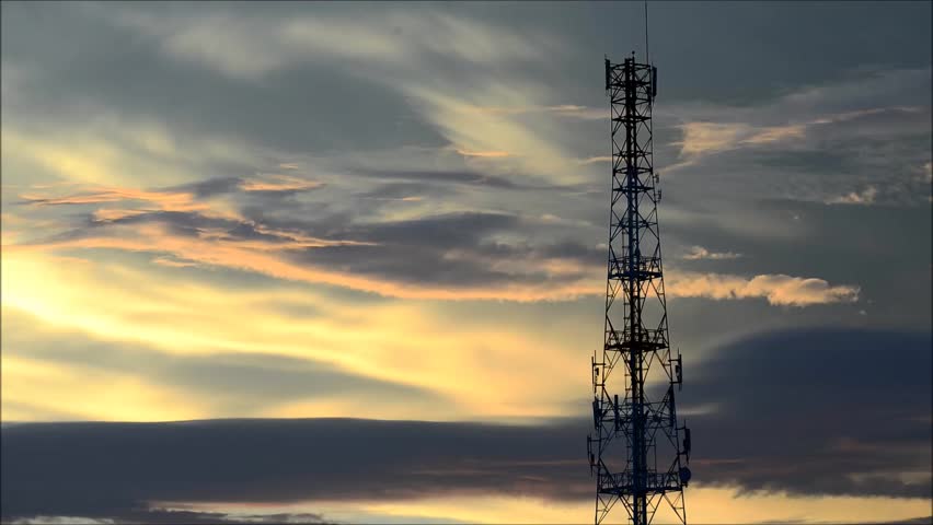 Telecommunication tower with beautiful sky background - HD stock footage clip