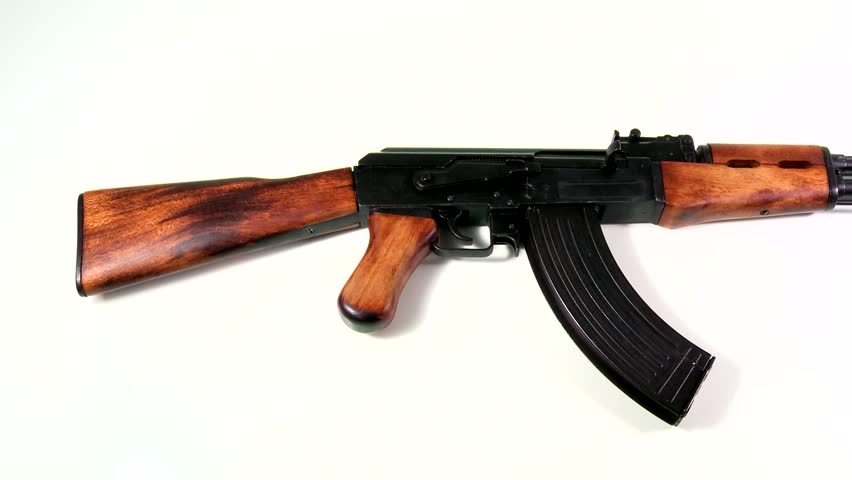 AK 47 Kalashnikov 1947, Beauty-shot On White Background, Knee-shot Of ...
